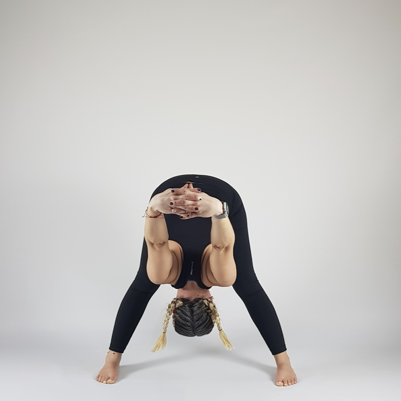 Wide-Legged Forward Fold Fingers Interlaced: Shoulder Opening | FLOW ...